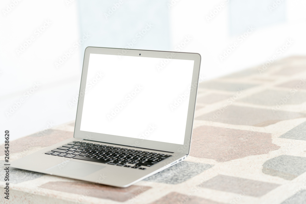 Outdoor remote working by light gray color laptop computer with white ...