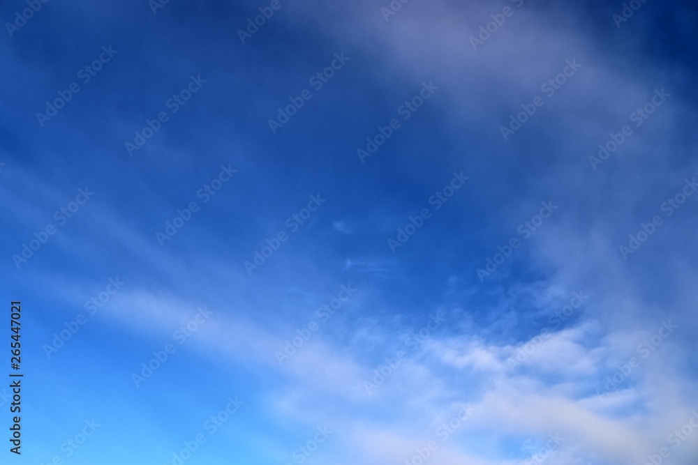 Beautiful mixed cloud formation with white and grey cumulus clouds in ...