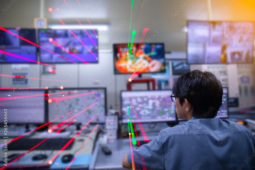 Engineering works with the tablet in the production control room ...