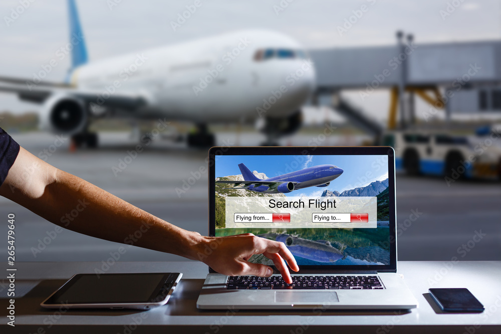 Blank screen laptop computer with airplane background Stock Photo ...