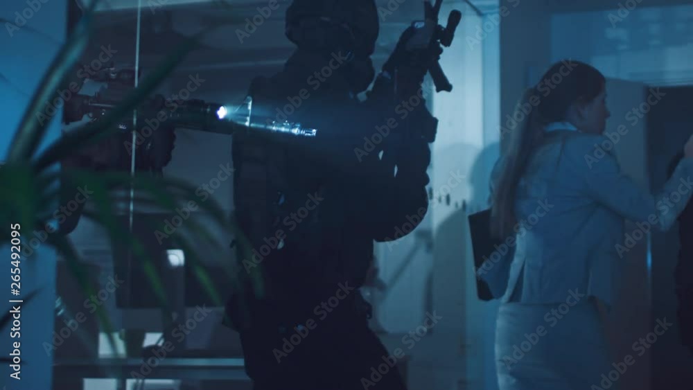 Masked Squad of Armed SWAT Police Officers Rescue a Female Hostage in a ...