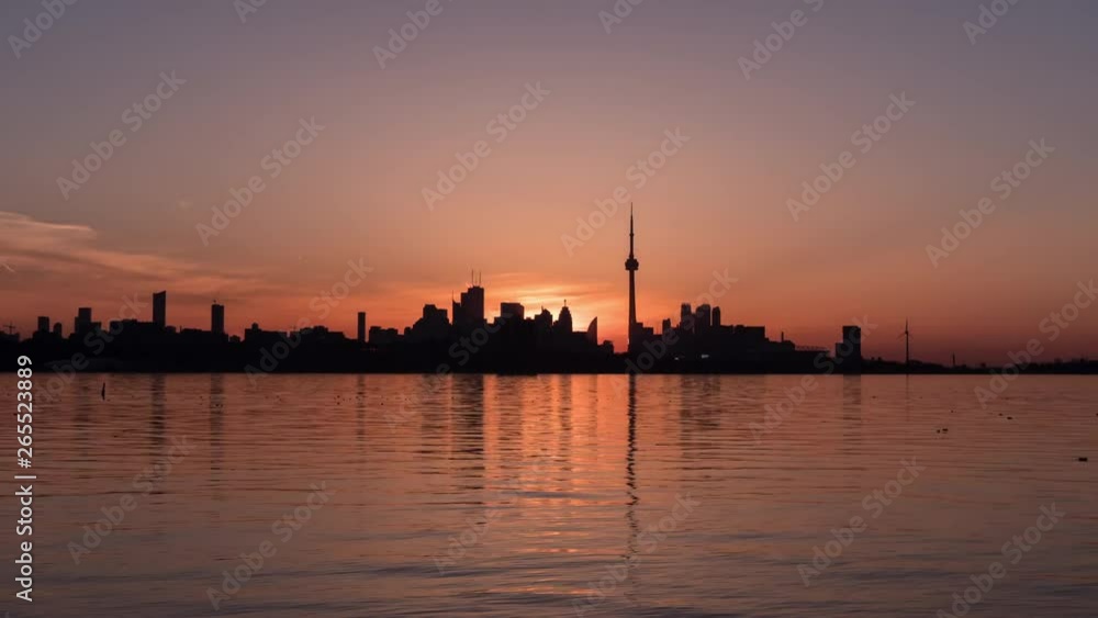 Video Stock Toronto Skyline Sunrise Time lapse. Sun rises behind the CN ...