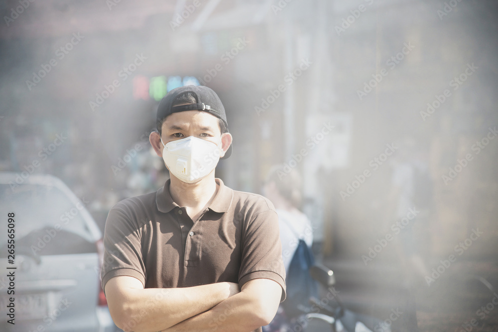 Man wearing mask protect fine dust in air pollution environment ...