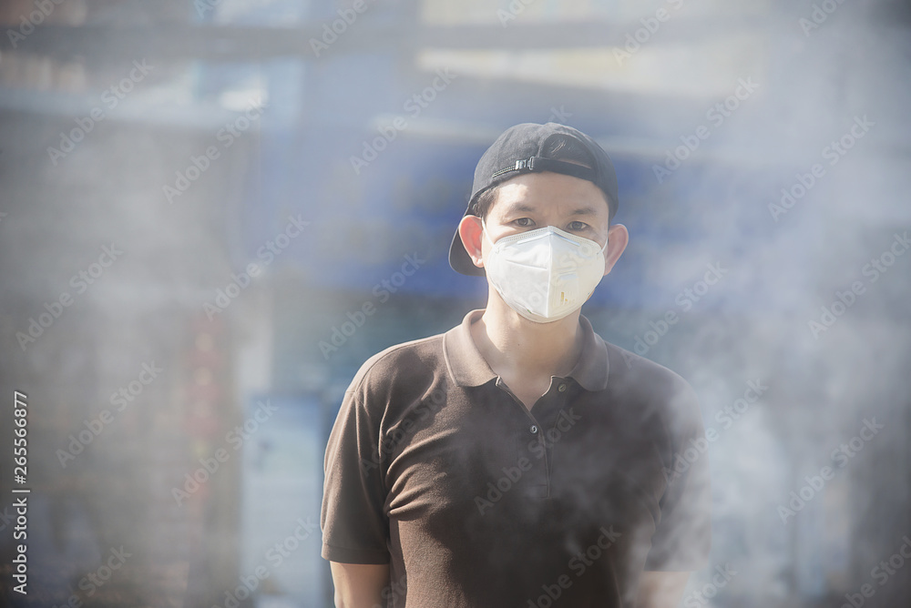 Man wearing mask protect fine dust in air pollution environment ...