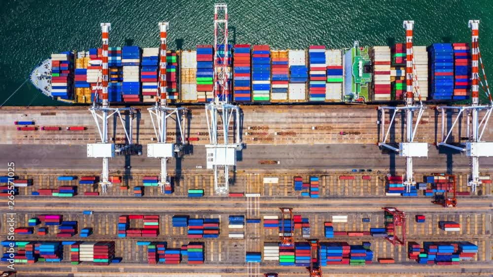 4k Hyper lapse aerial view container cargo ship loading and unloading ...