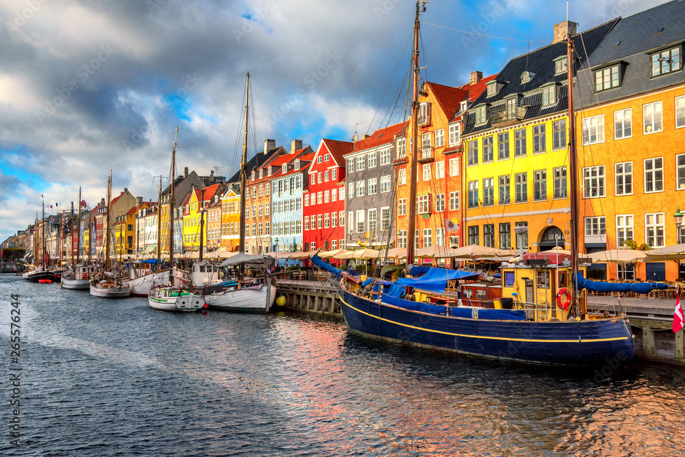 Nyhavn area of popular bar and restaurant at beautiful blue sky, with ...