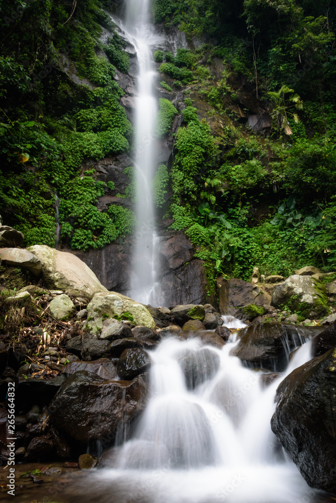 Beautiful scene of Semirang Waterfall with lovely smooth water. A ...