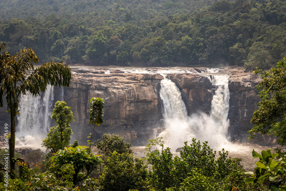 Waterfall Athirapally front view from distance with green forest Stock ...