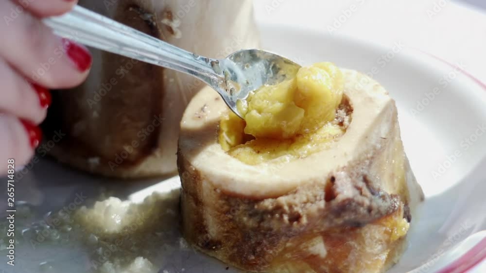 Women eating Traditional Bone Marrow at Restaurant CU Stock ビデオ | Adobe ...