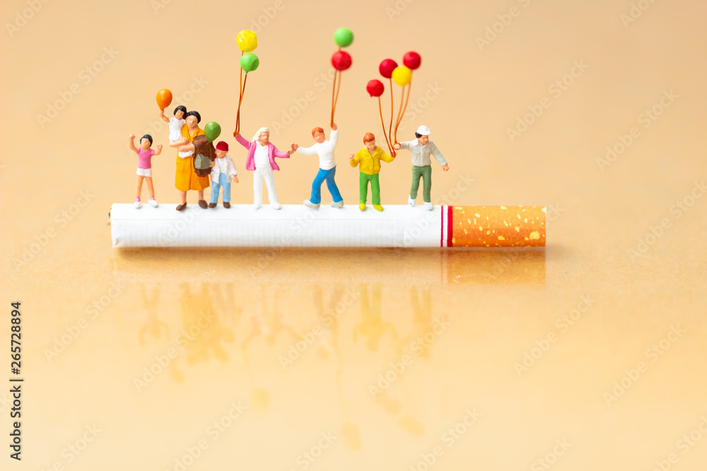 World no tobacco day. Cigarette and family figure. a concept for stop ...