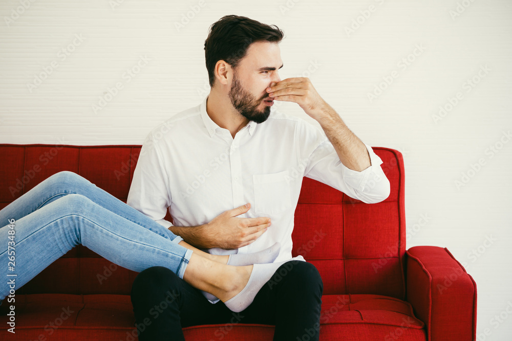 This Foot of a girl with a smell. something stinks, very bad smell ...
