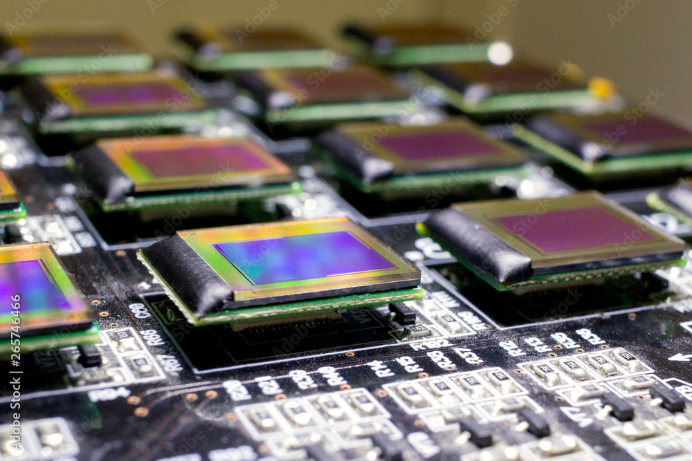 The process of checking several oled displays on the test station. The ...