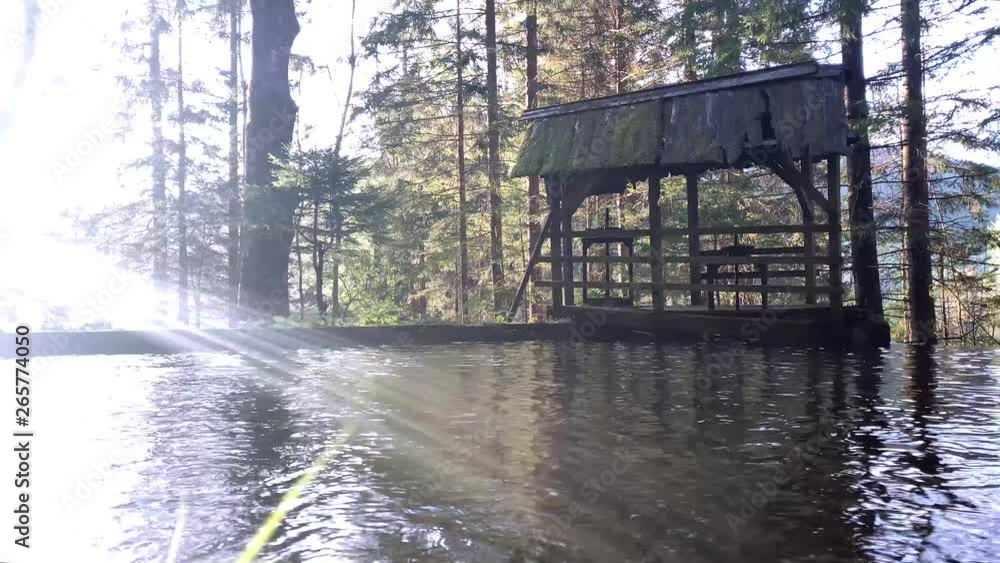 Old quiet dam in the forest in sunset. Wooden and rotten dam in the ...