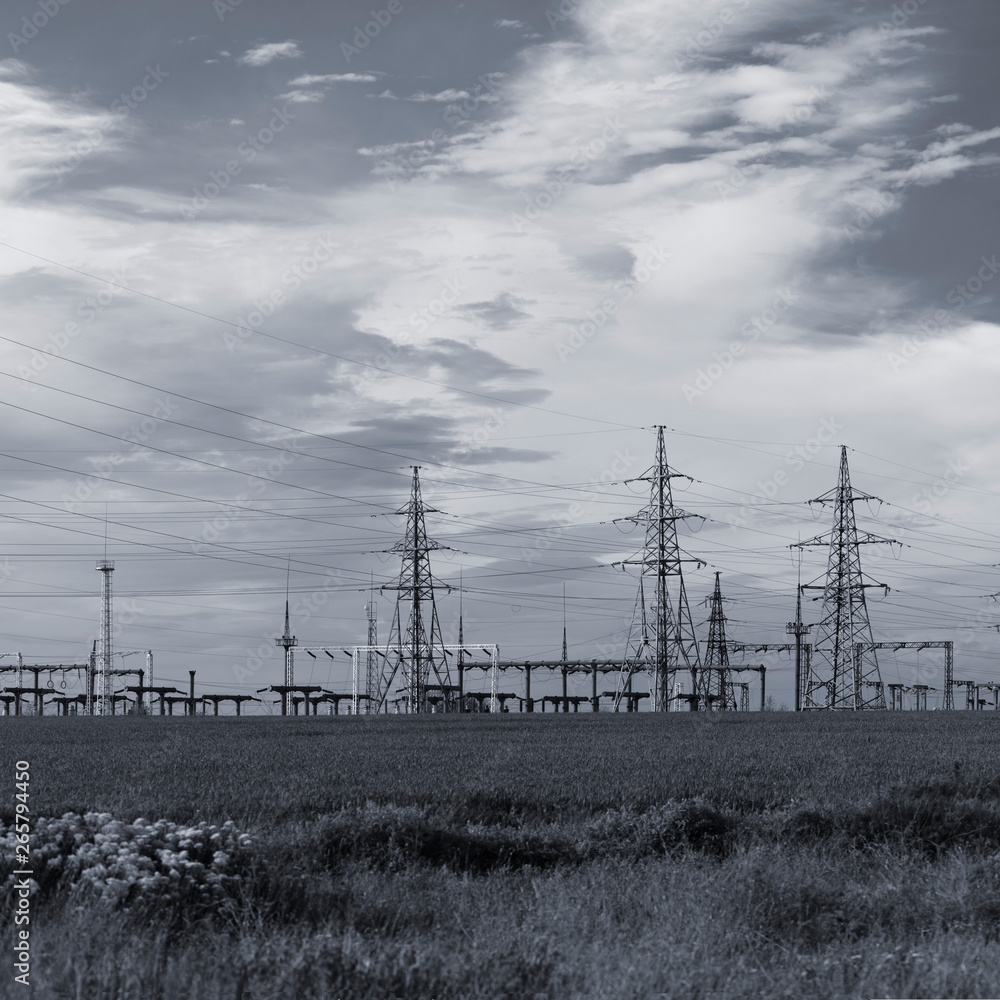 Power lines and sky with clouds.High voltage power lines.Field and ...