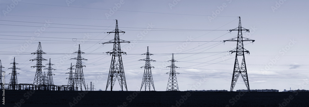 Power lines and sky with clouds.High voltage power lines.Field and ...
