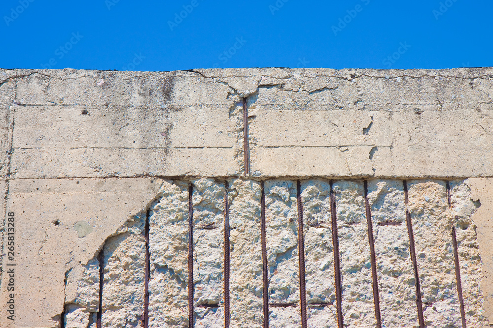 Old reinforced concrete structure with damaged and rusty metallic ...