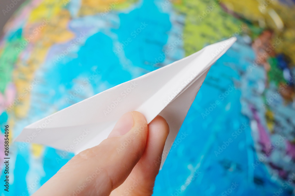 Globalization, world, travel concept, world society - paper airplane in ...