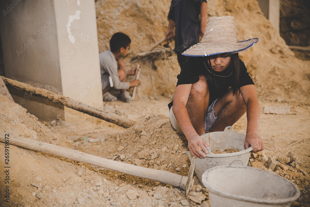 Little boys and girls labor working in commercial building structure ...
