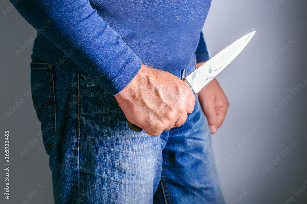 Harassment concept. Man With Knife Coming To His Wife. Home Violence ...
