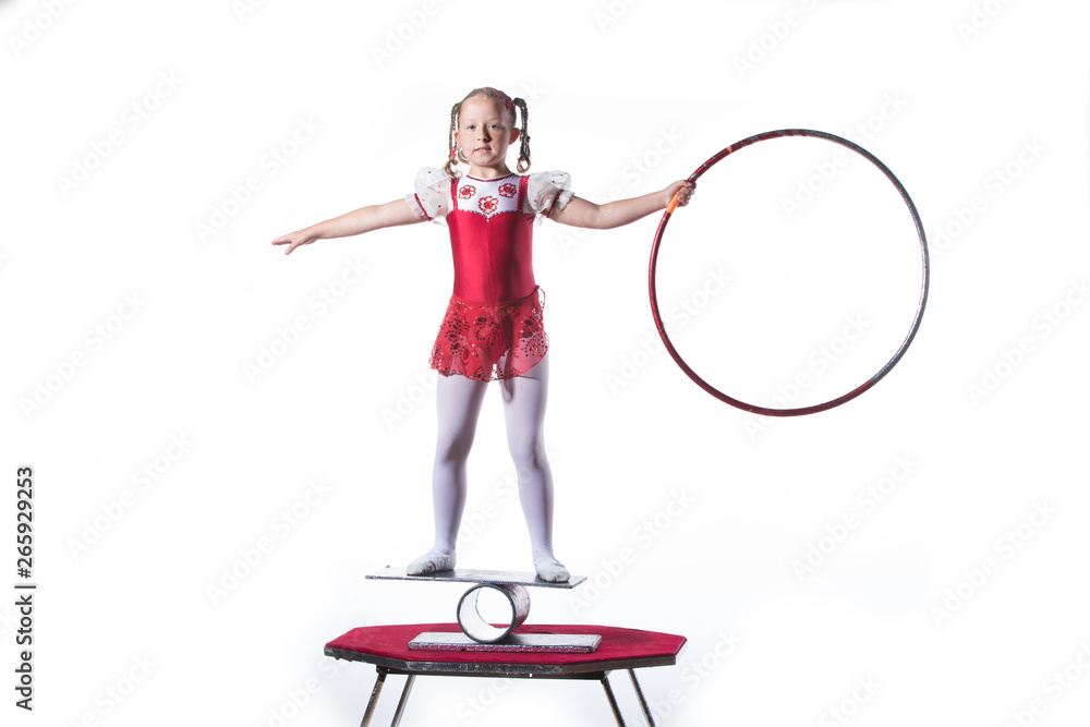 Little girl balancing act on white background. Young gymnast balancing ...