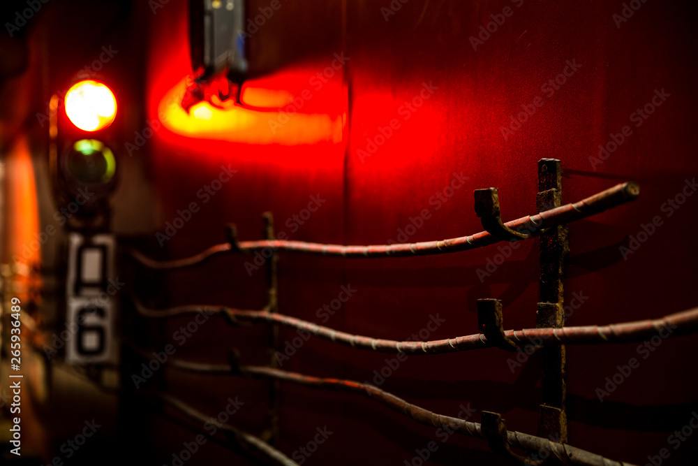 Red signal of the traffic light and wires in the subway Stock Photo ...
