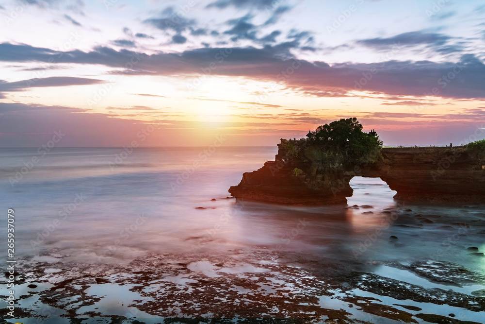 Sunset near famous tourist landmark of Bali island - Tanah Lot & Batu ...