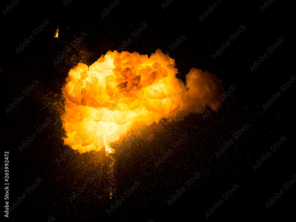 Realistic fiery explosion with sparks over a black background Stock ...