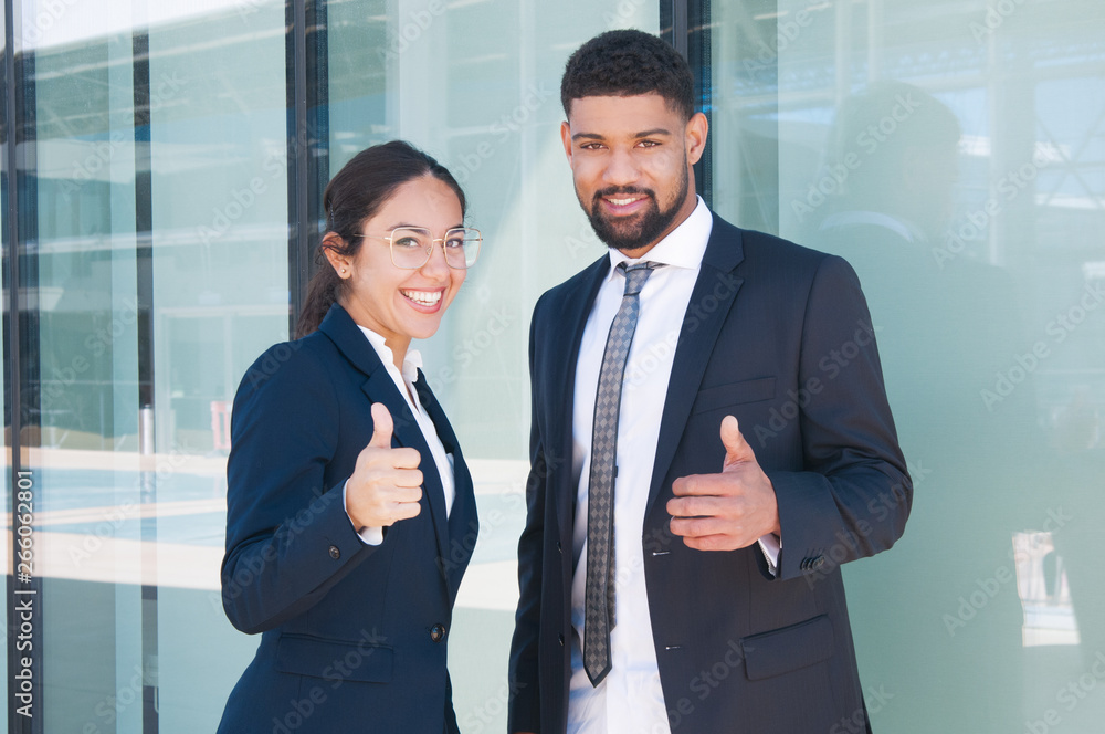 Happy confident business partners enjoying teamwork. Smiling young man ...