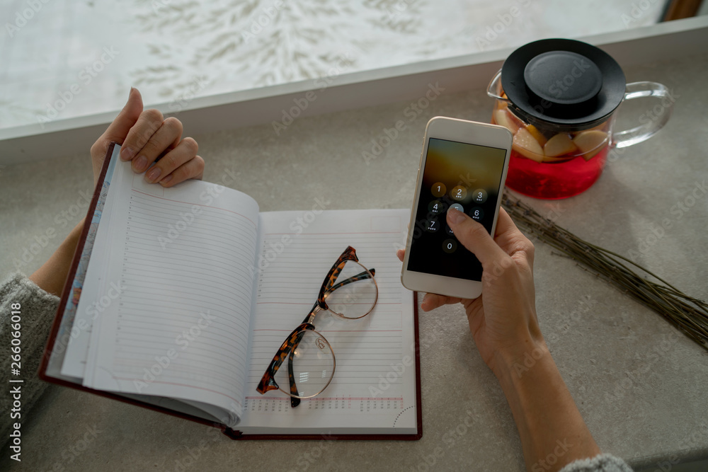 Selective focus on cellphone in hands. Close up view of woman internet ...