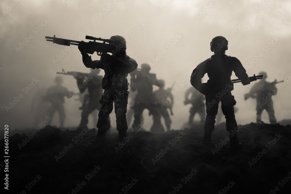 War Concept. Military silhouettes fighting scene on war fog sky ...