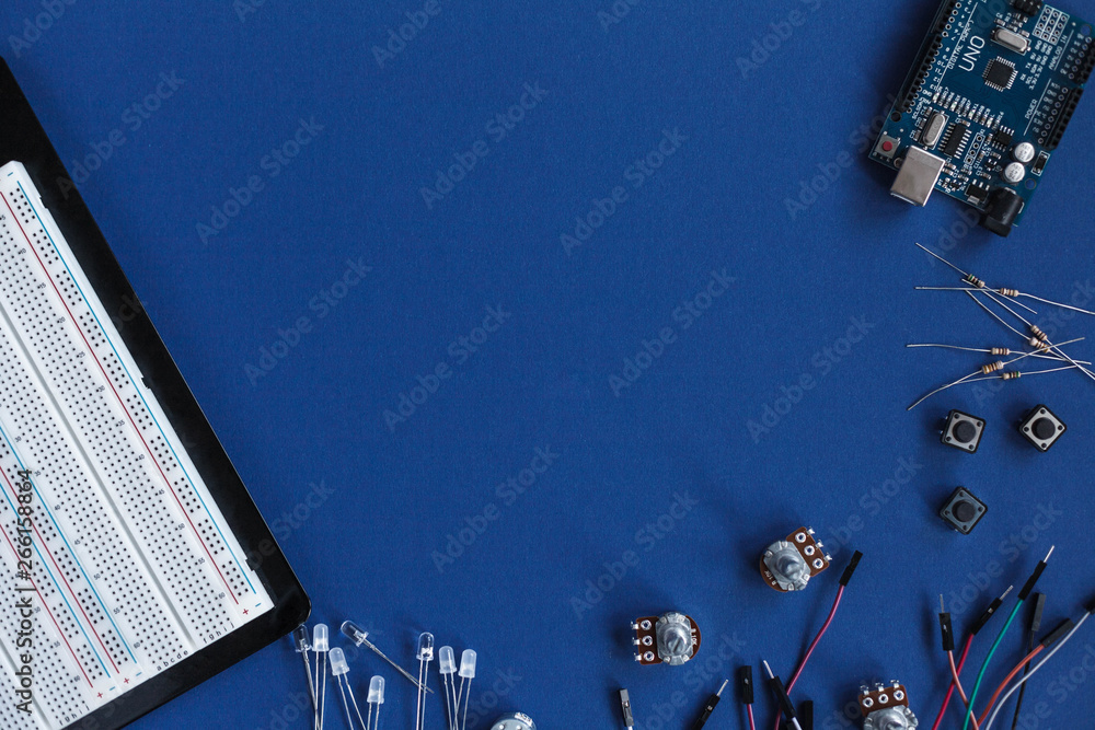 DIY electronic kit on the blue background, FLAT LAY, variety of sensor ...