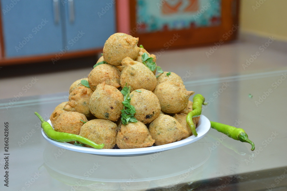 Methi na Gota Recipe, Popular Indian street food, Gujarati snack Stock ...