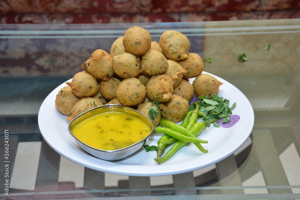 Methi na Gota Recipe, Popular Indian street food, Gujarati snack Stock ...