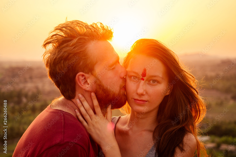 copy spase lady and boy hugging Hampi ruins hills meeting sunrise ...