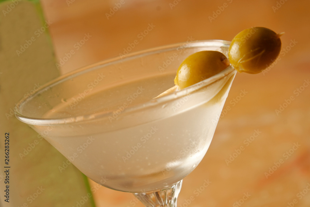 The martini is a cocktail made with gin and vermouth, and garnished ...