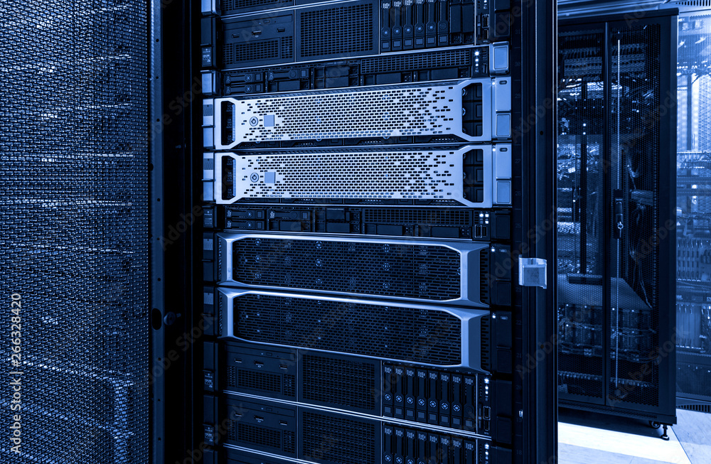 Server racks with mainframe disks cloud storage blue neon toning Stock ...