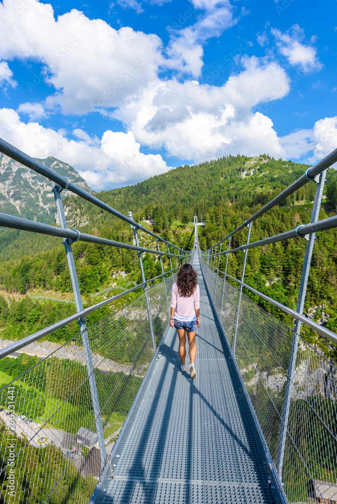 Suspension Bridge at Reutte between two hills in beautiful landscape ...