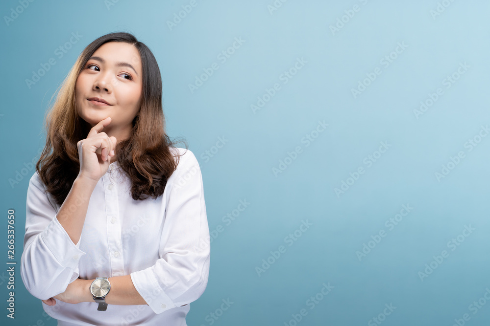 Portrait of a confident woman standing isolated over background Stock ...