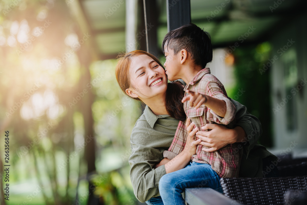 happy harmonious family outdoors concept.mother and son have activities ...
