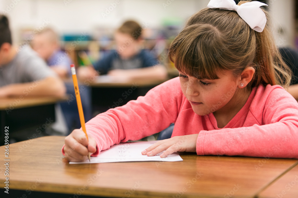 Classroom: Young Girl Student Works On Math Quiz Stock Photo | Adobe Stock