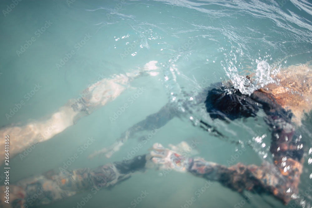 Swimming under water Stock Photo | Adobe Stock