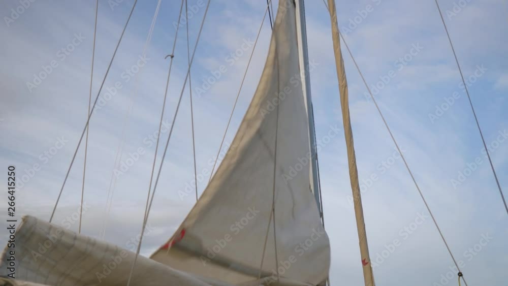 Sail being hoisted on sailing training yacht Stock 비디오 | Adobe Stock