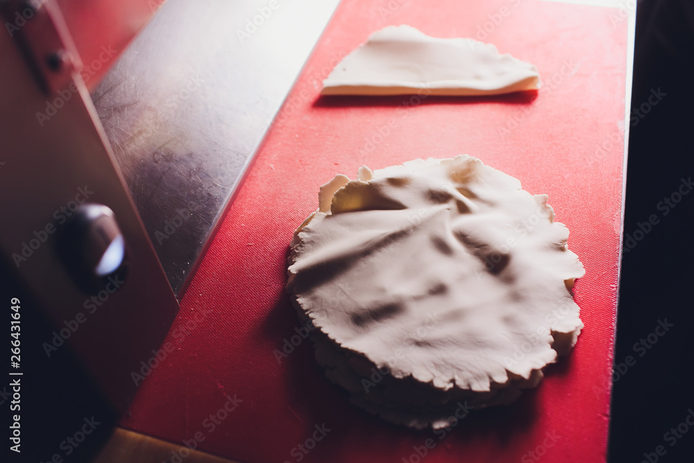 Chef making dough pastry sheeter bakery Baker forming shaping dough ...