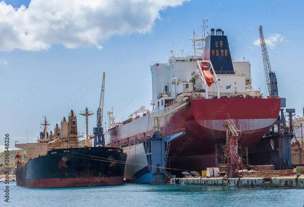 Bulk Carrier On Dry Dock In Shipyard.Heavy lifts cargo ship temporary ...