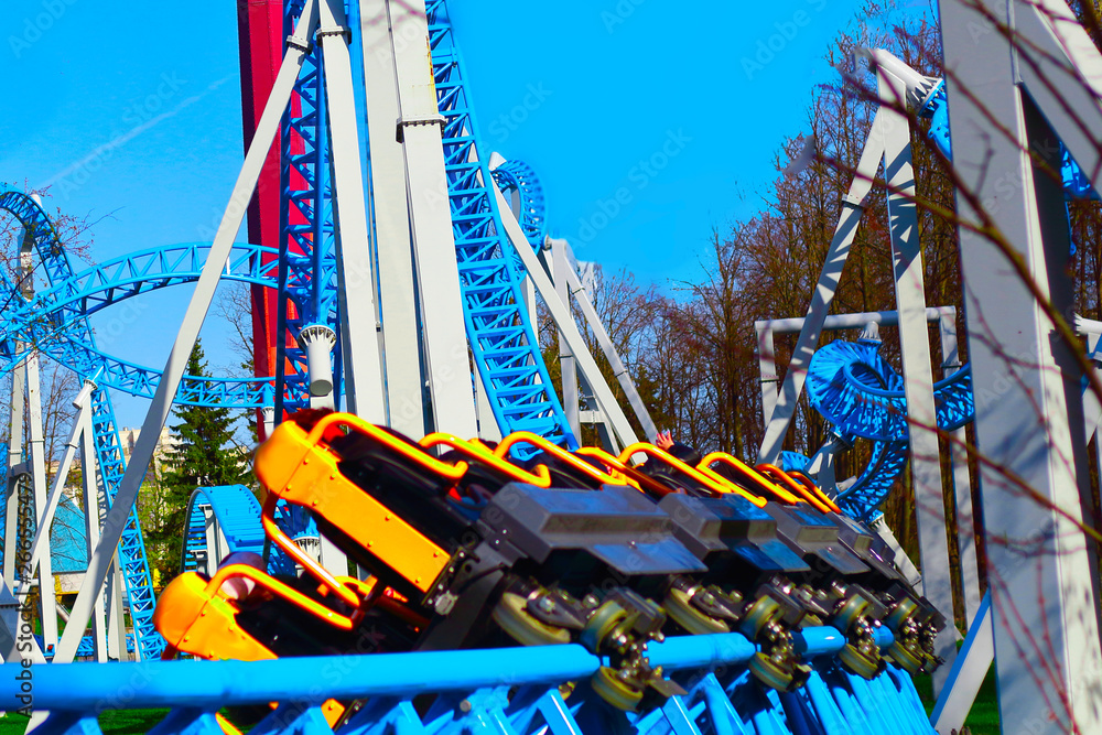 People relax, have fun and fast ride the blue spooky scary roller ...