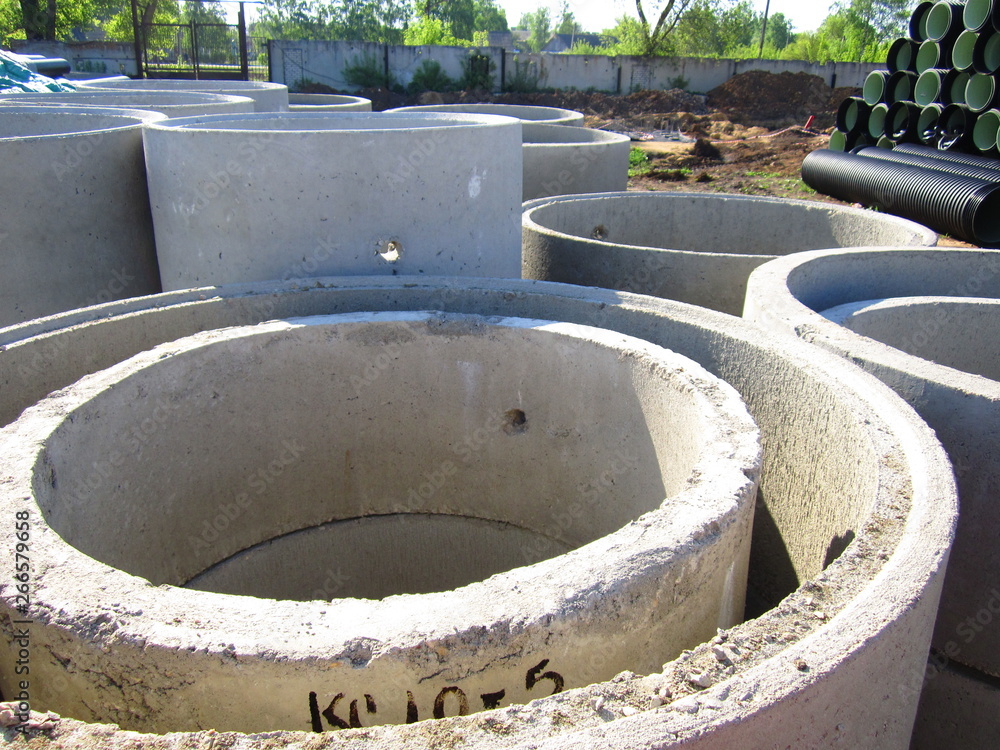 Reinforced concrete rings for the installation of wells Stock Photo ...