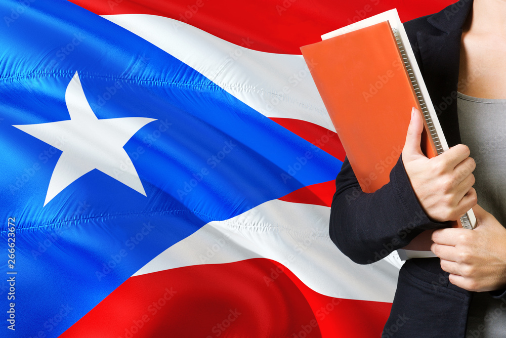 Learning language concept. Young woman standing with the Puerto Rico ...