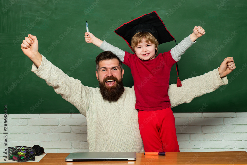 Elementary school teacher and student in classroom. Yay. Smiling ...