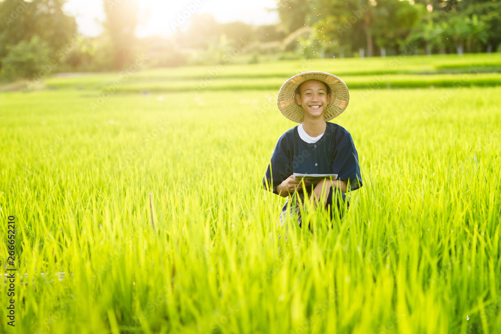 Lifestyle of Young asia farmer in thai tradition custome smiling with ...