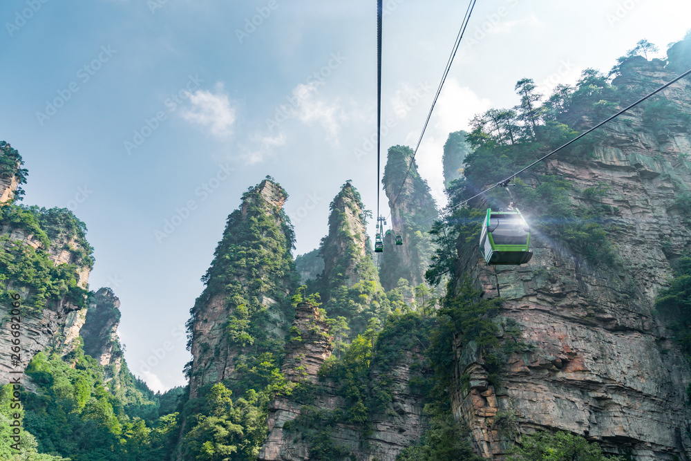 A cable car up to Huangshizhai scenic area in Zhangjiajie National ...